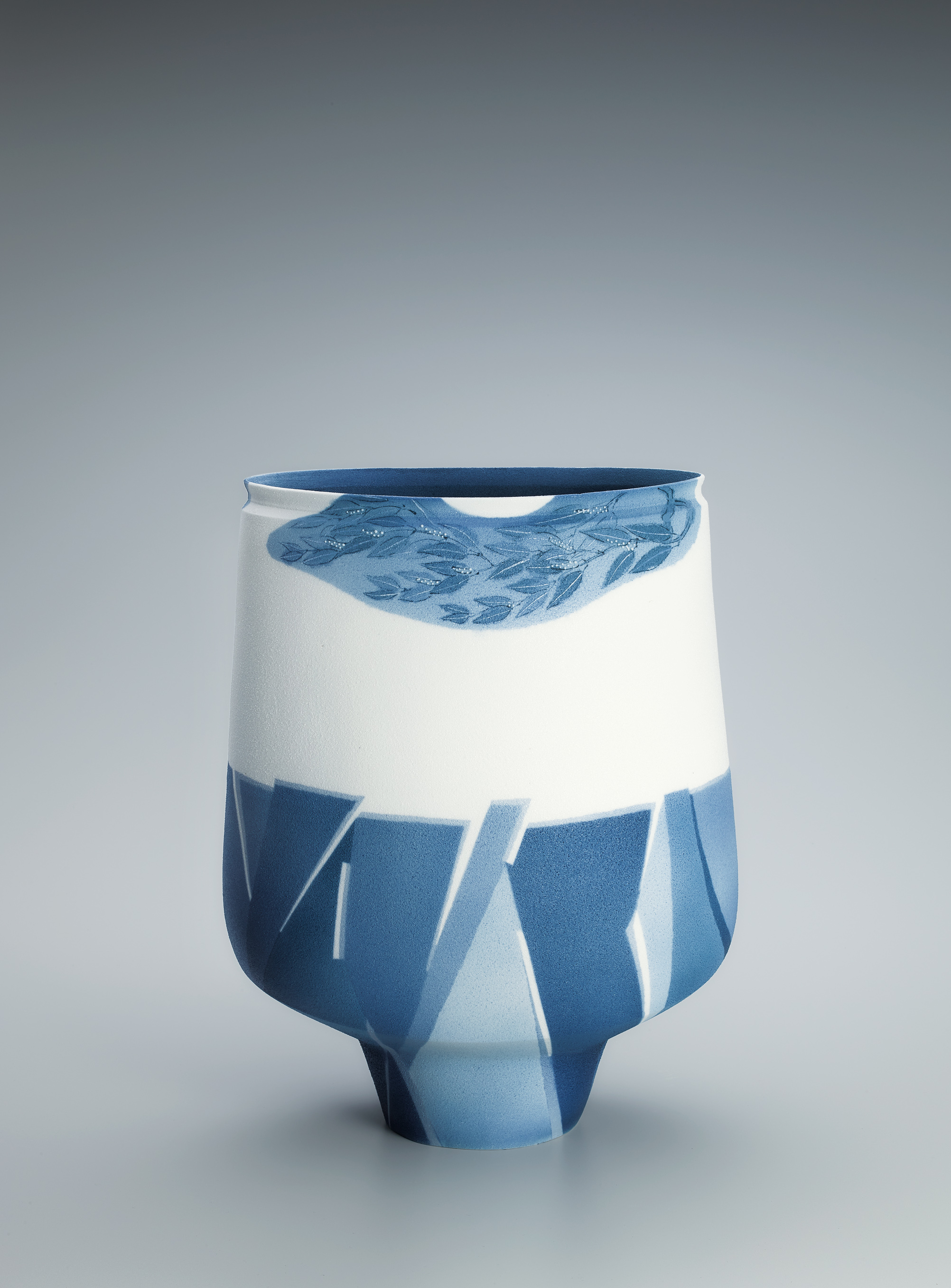 Jar in irregular shape with design in underglaze blue and overglaze ...